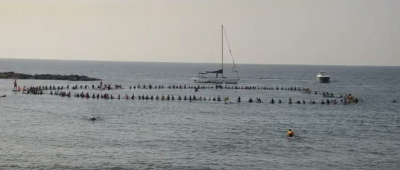 Israeli surfer's make circle for Doc Paskowitz, the man who brought ...